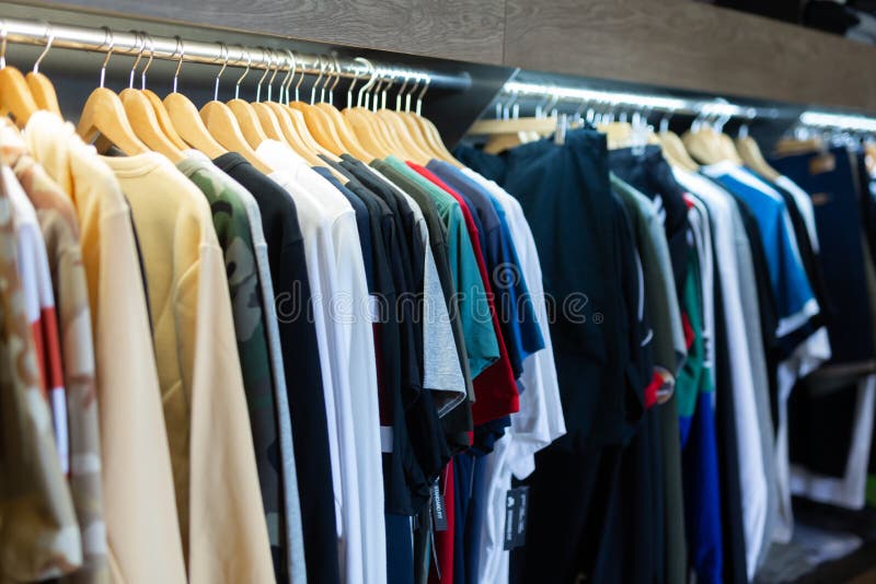 Stand with Various Clothes in Clothing Boutique Stock Photo - Image of ...