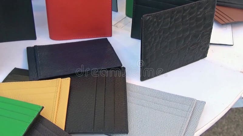 A Stand with Various Wallets for Sale. Stock Video - Video of colorful ...