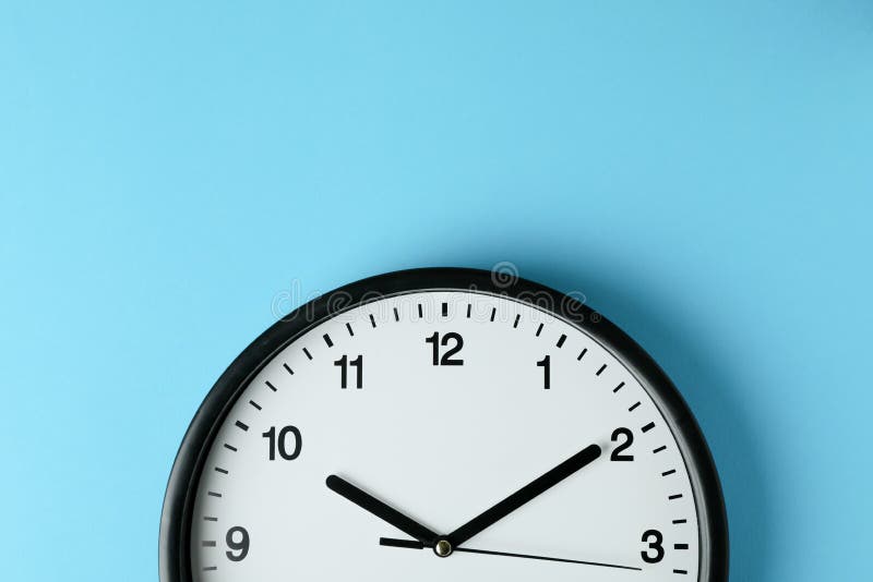 Standard Black Office Clock on Blue Background Stock Image - Image of ...