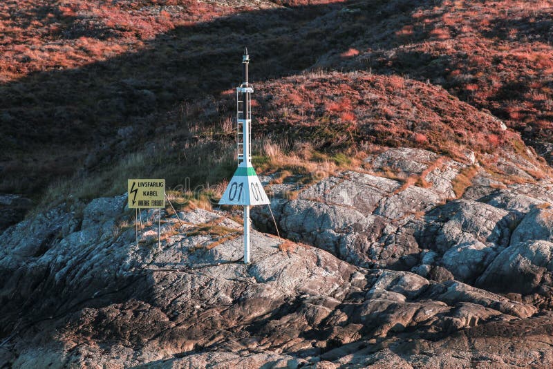Standard White Metal Beacon and Warning Sign Stock Photo - Image of ...