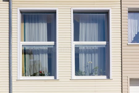 Standard Windows in Mass Plastic House Stock Image - Image of front ...