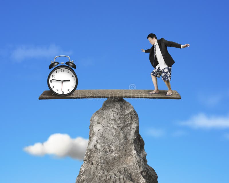 Standing and Balancing with Alarm Clock on Board at Hilltop Stock Image ...