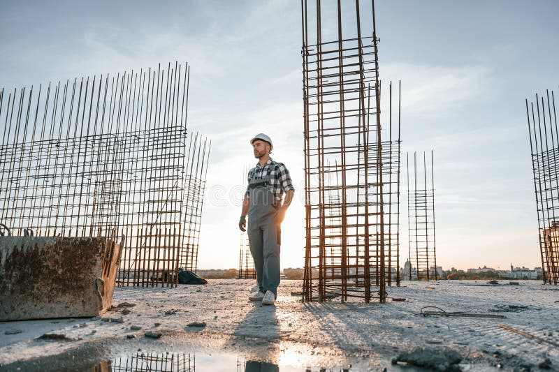 Standing in a Beautiful Sunlight. Man is Working on the Construction ...
