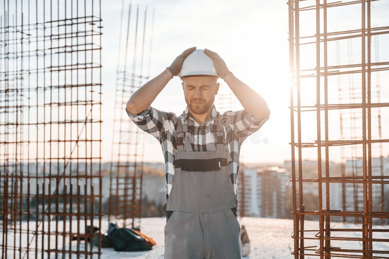 Standing in a Beautiful Sunlight. Man is Working on the Construction ...