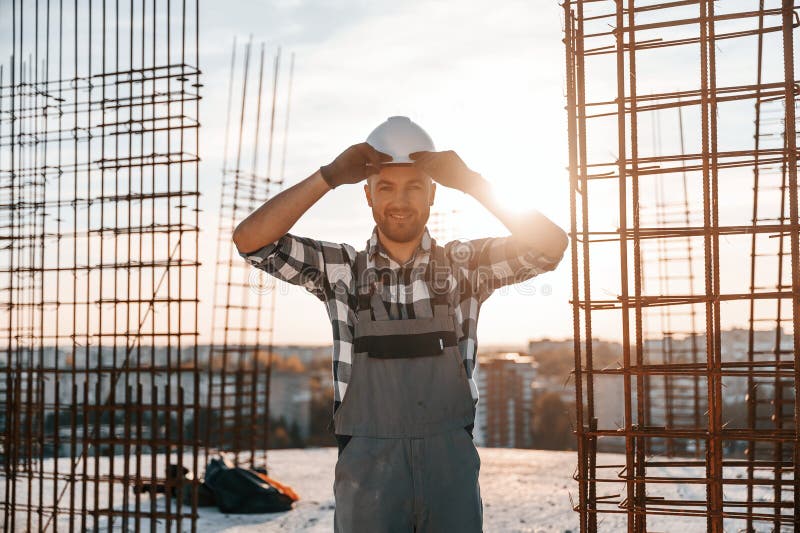 Standing in a Beautiful Sunlight. Man is Working on the Construction ...