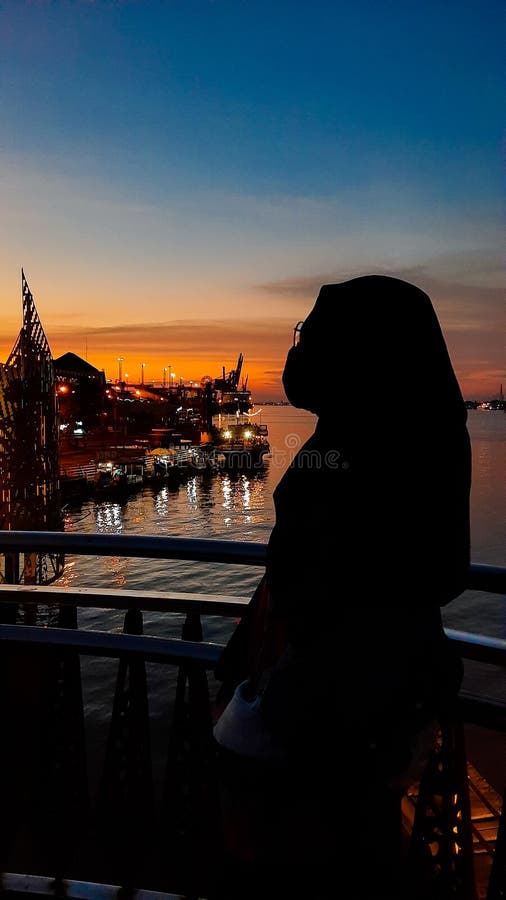 Looking at Sunset. Family of Mother, Father and Kids is on the Camping ...