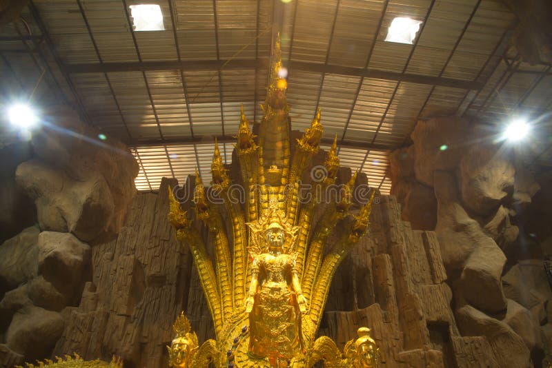 The Standing Buddha Image is in the Posture of a Serpent with a Serpent ...