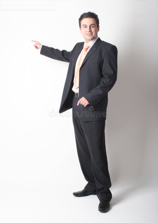 Standing Businessman Pointing at Chart Stock Photo - Image of chart ... Standing Businessman Pointing at Chart Stock Photo - Image of chart ...