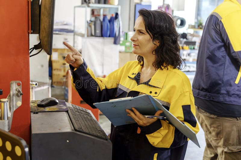 Standing by Computer Terminal in Automobile Workshop Stock Image ...