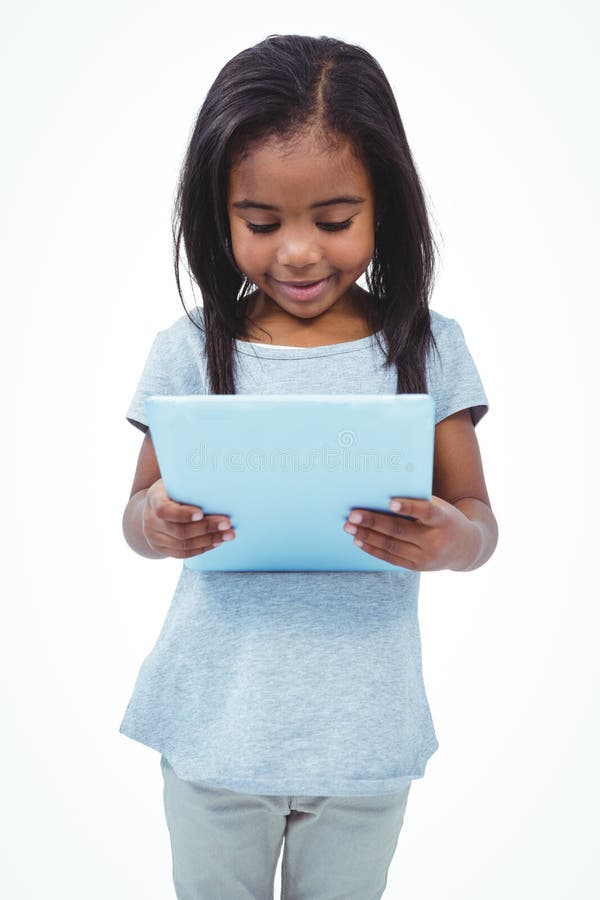 Standing girl using tablet stock photo. Image of scrolling - 64962552