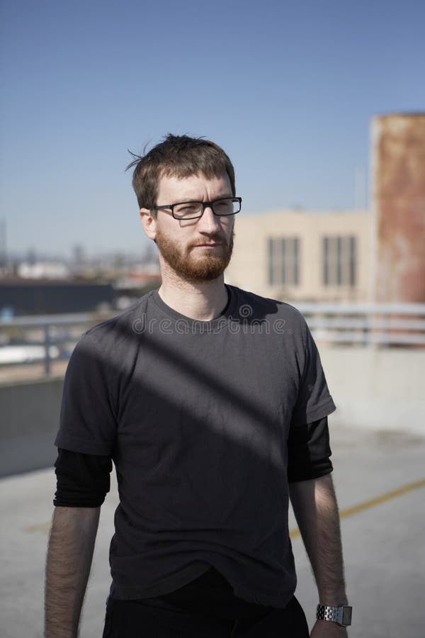 Standing half in shade 04 stock image. Image of individual - 1922059