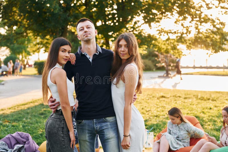 Standing and Having Fun. Group of Young People Have a Party in the Park ... Standing and Having Fun. Group of Young People Have a Party in the Park ...