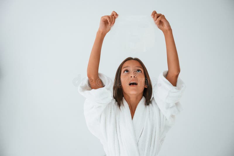 Standing, Having Fun, in White Robe, Holding Mask. Conception of Beauty ...