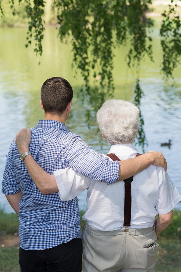 At the Lake with Grandpa stock image. Image of neighbor - 848543