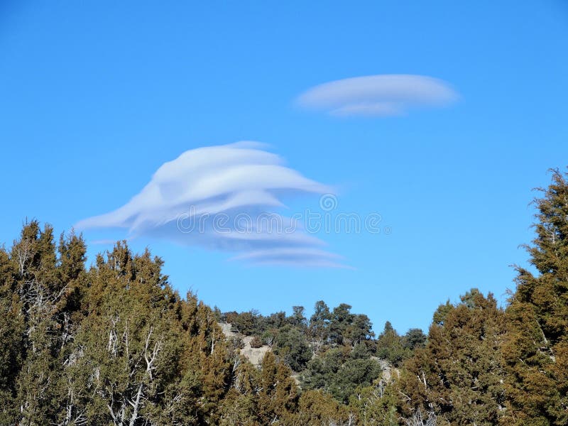 Standing Lenticular (Lenticularis) Clouds Stock Image - Image of ...