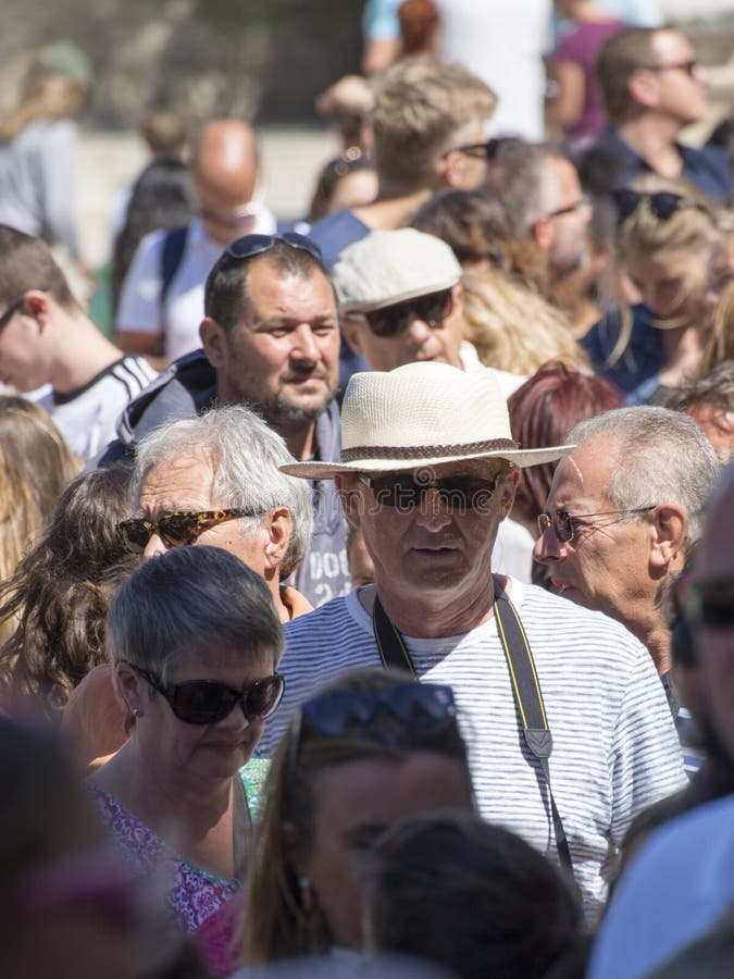 Standing in line editorial stock photo. Image of watching - 77328723