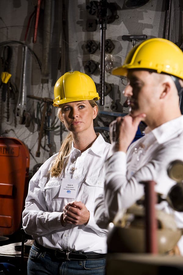 Colleagues in Maintenance Room Stock Image - Image of management ...