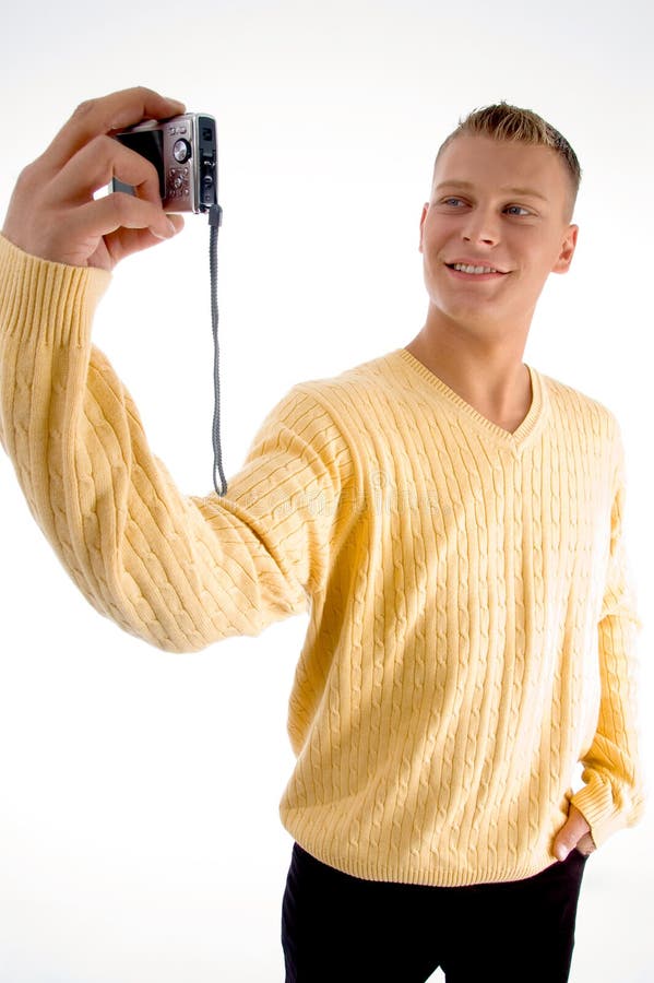 Standing male with camera stock photo. Image of person - 7418600