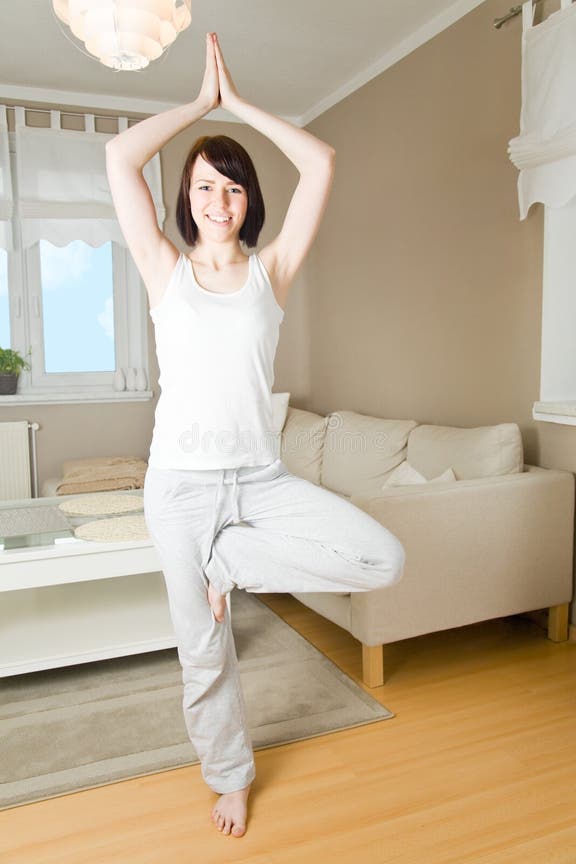 Standing on one leg stock image. Image of indoor, meditation - 9285295