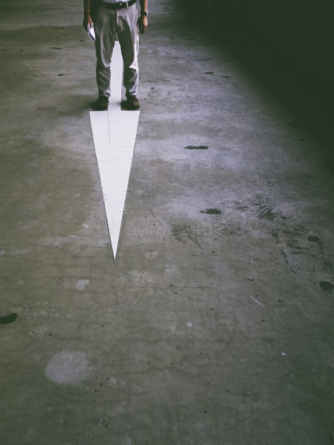 Standing on a Painted Arrow Stock Photo - Image of path, truth: 42239140