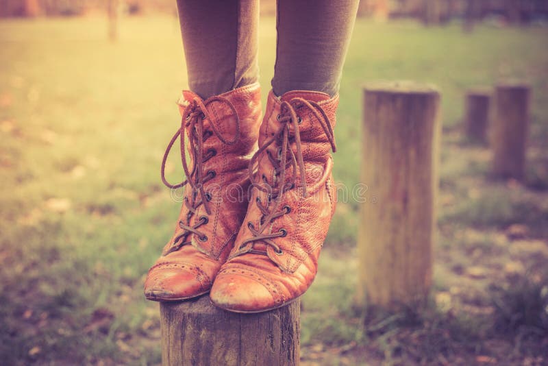 Standing on a post stock image. Image of sunny, boot - 38098145