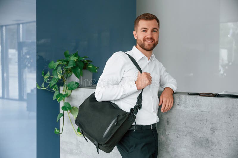 Standing at Reception. Elegant Man in Formal Clothes is Indoors Stock ...