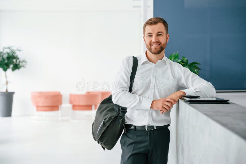 Standing at Reception. Elegant Man in Formal Clothes is Indoors Stock ...