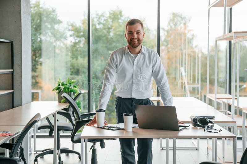 Standing and Smiling. Man in Formal Clothes is Working in the Modern ...