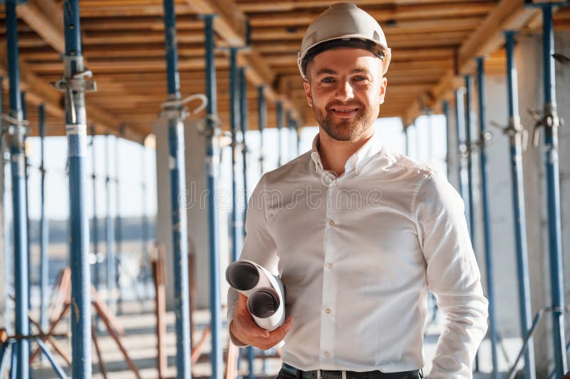Standing and Smiling. Man is Working on the Construction Site at ...