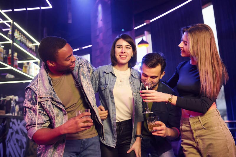 Standing Together. Group of Friends Having Fun in the Night Club Stock ...
