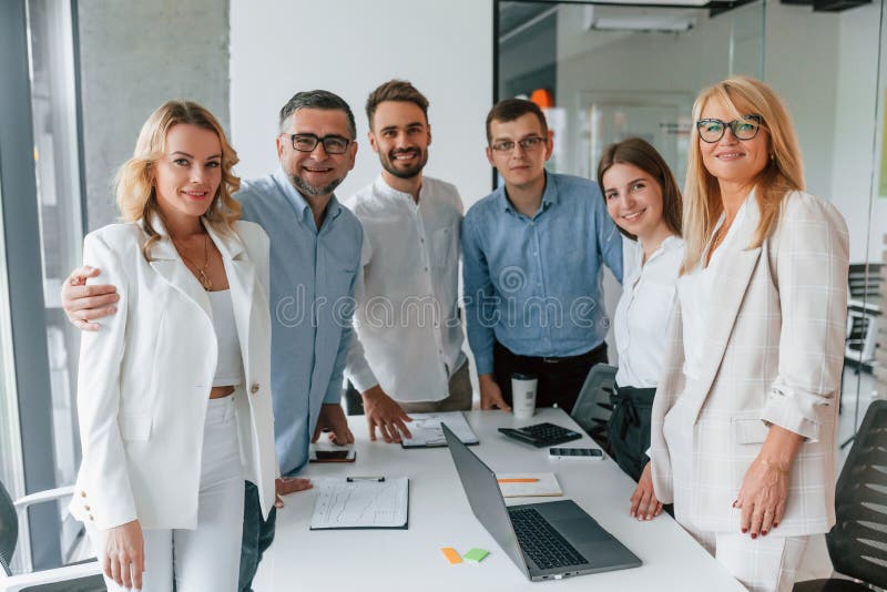 Standing Together, Looking into the Camera and Smiling. Group of ...
