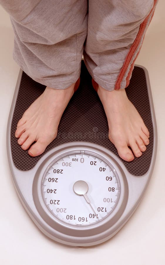 Standing on weight scale stock image. Image of pound, number - 4400365