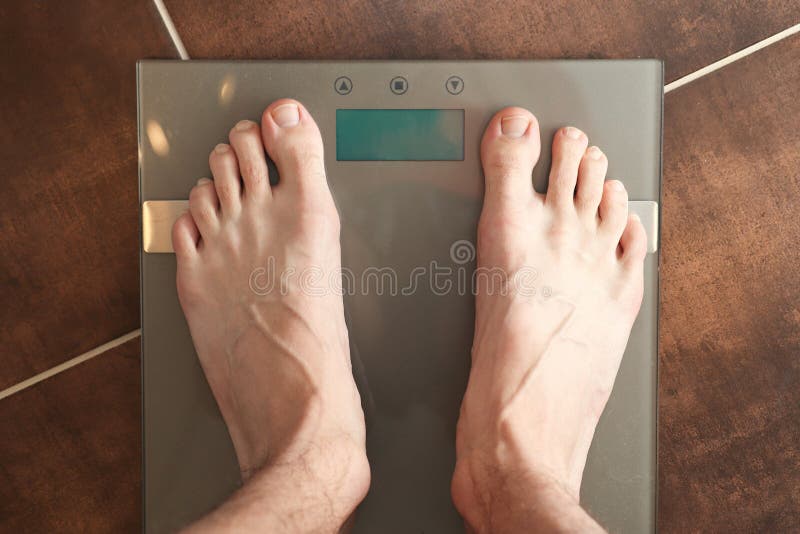 Standing on the Weight Scale. Stock Photo - Image of feet, loss: 187062932