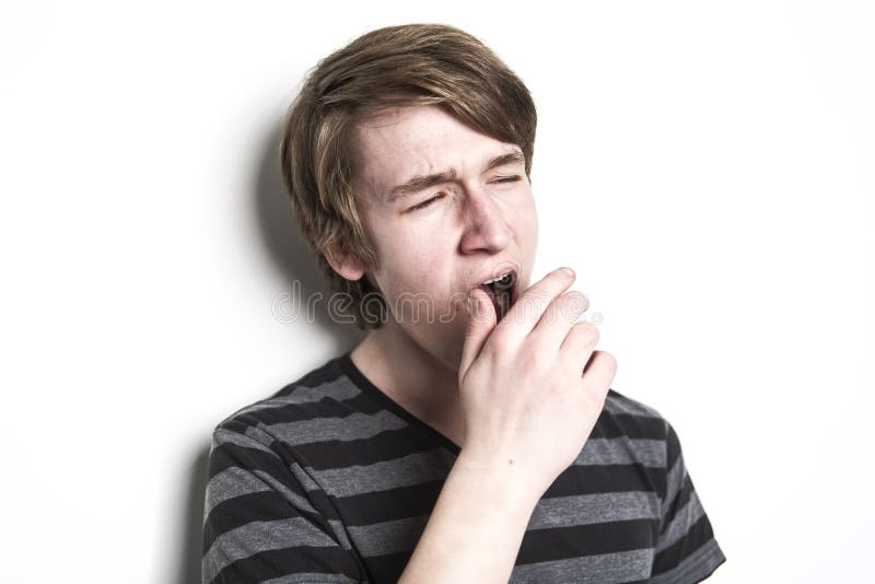 Standing Young Tired Man Yawning and Stretching Stock Photo - Image of ...