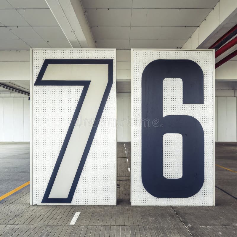 Standout Numbers Displayed Prominently in a Parking Structure Represent ...