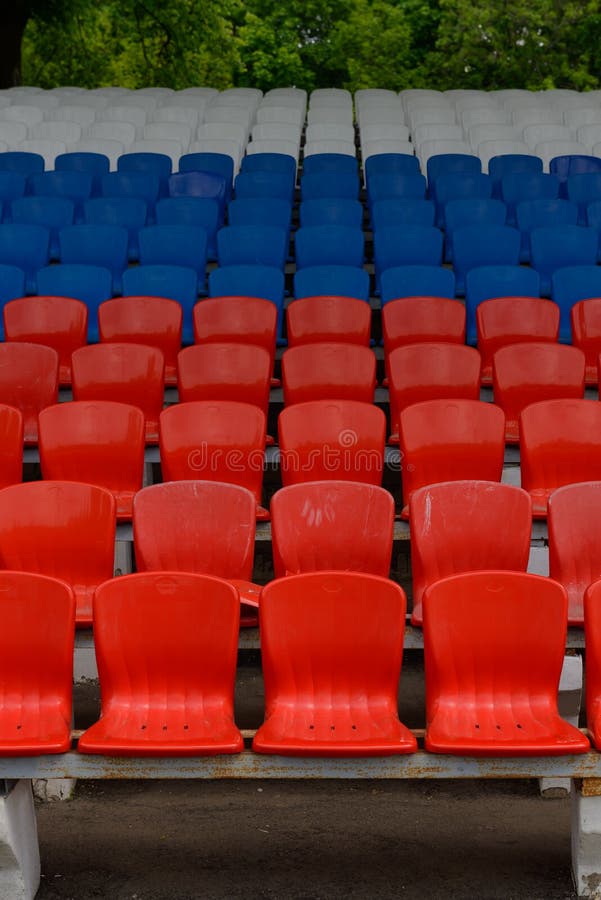 Stands of a Small Stadium with Rows of White, Blue and Red Seats Stock ...