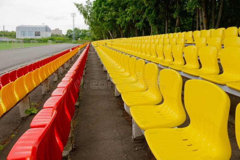 Stands of a Stadium with Yellow and Red Seats Stock Photo - Image of ...