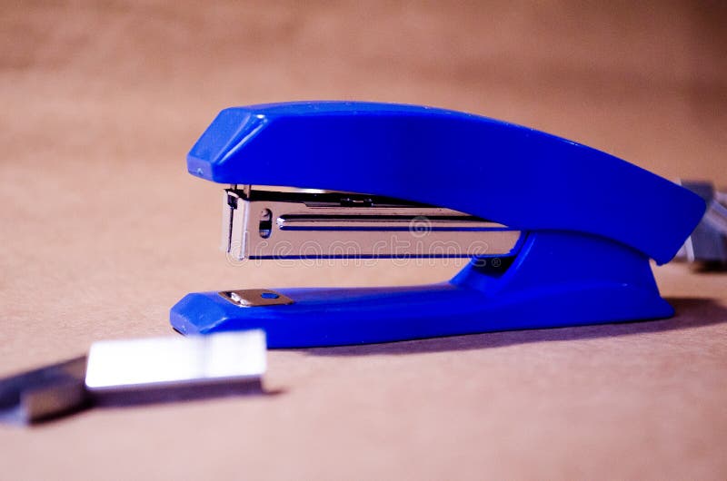Stapler. Stapler Blue. Stapler and Staples. Stapler is on the Table ...