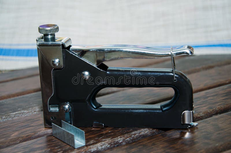 Stapler with Brackets and Wood Construction Stapler Stock Image - Image ...