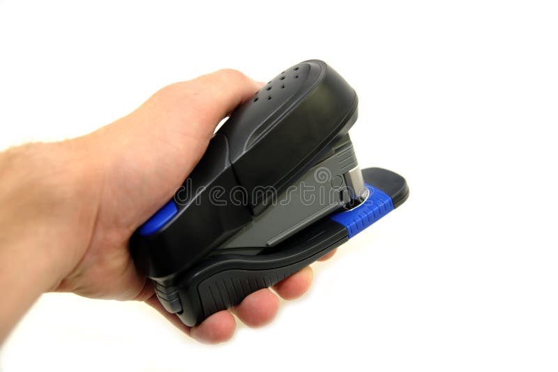 Stapler in Hand stock image. Image of equipment, paper - 25961511