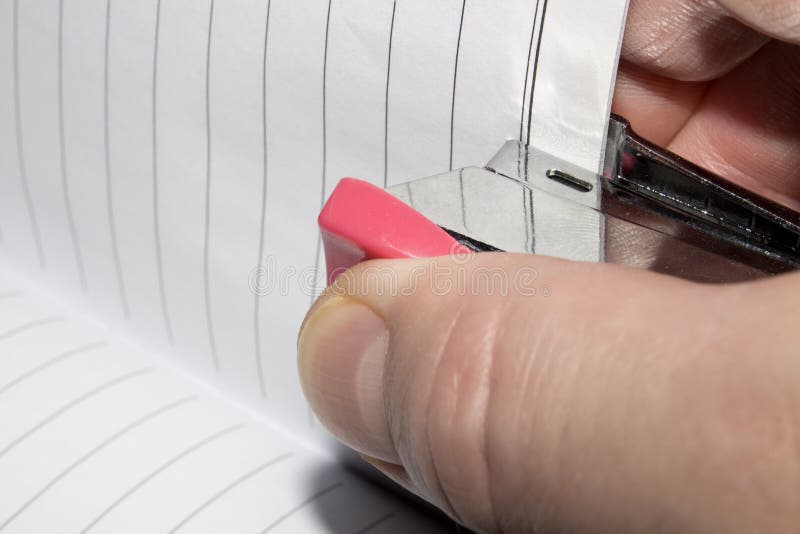 Stapler in Hand.Stapling Paper with Staples. Stock Photo - Image of ...