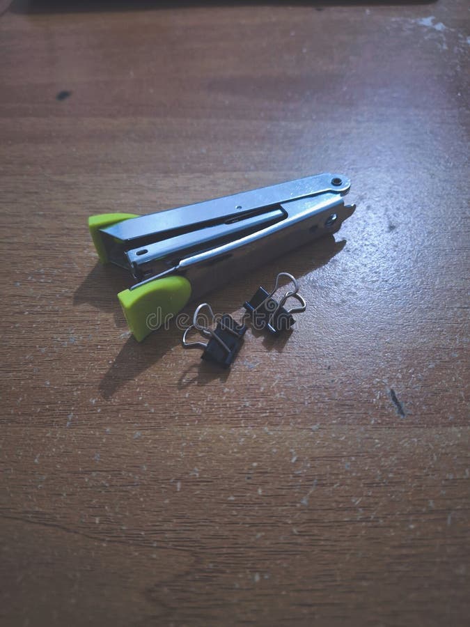 Stapler and Paper Clips on the Office Table Stock Image - Image of ...