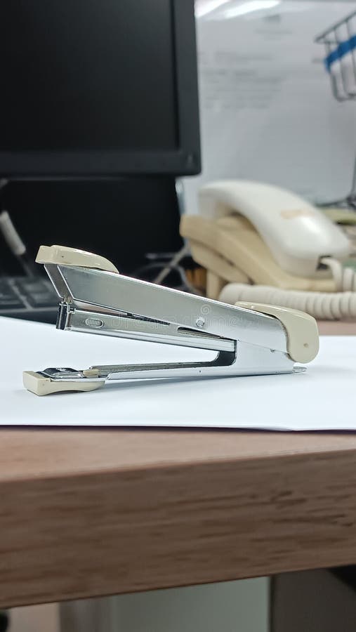 Stapler and paper stock image. Image of white, stapler - 283054449