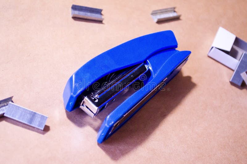 Stapler. Stapler Blue. Stapler and Staples. Stapler is on the Table ...