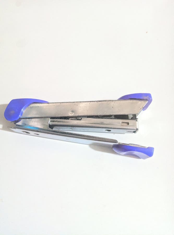 Staples with Blue Handles on a White Background. Stock Image - Image of ...