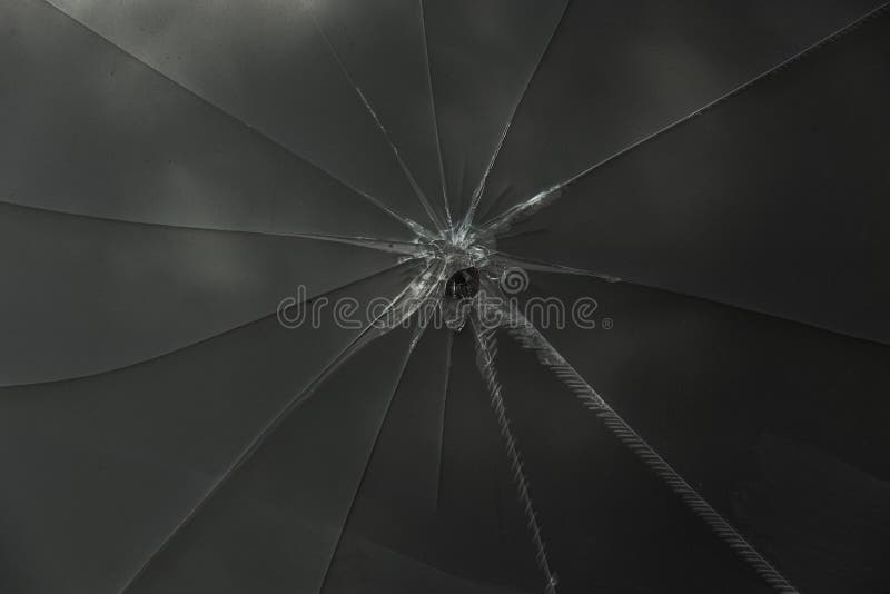 Star Blast Cracks in the Glass Panel. Broken Glass Texture Stock Photo ...