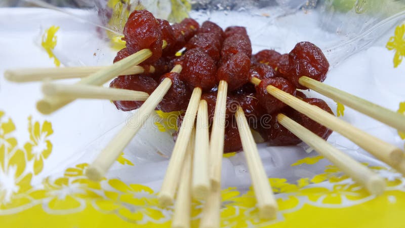 Star Gooseberry in Syrup on Bamboo Stick Stock Image - Image of ...