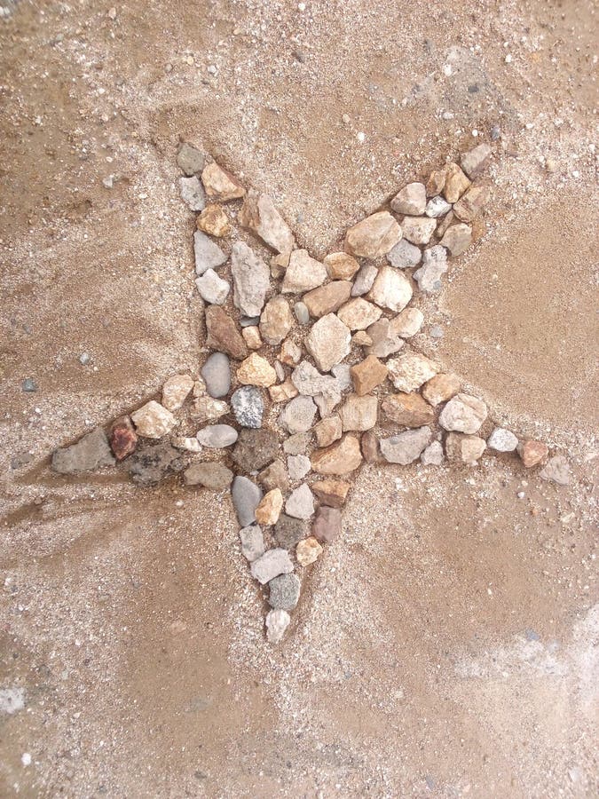 A Star made of pebbles stock photo. Image of diagram - 312869234