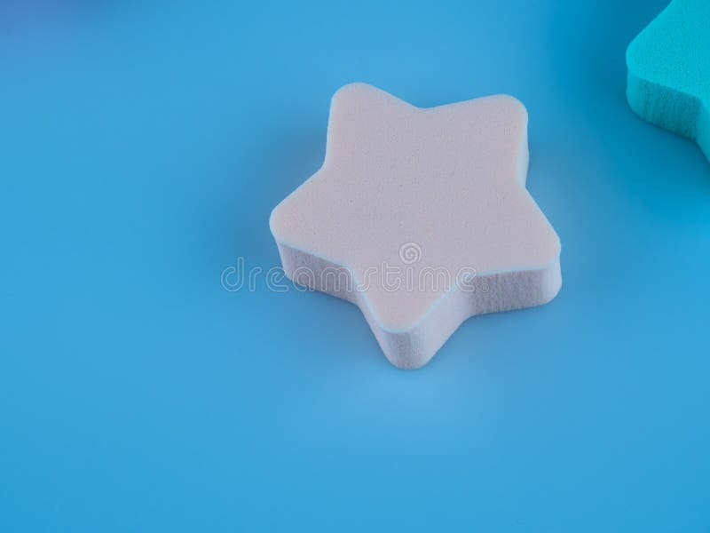 Star Shape Sponge Isolated Blue Background Stock Photo - Image of ...