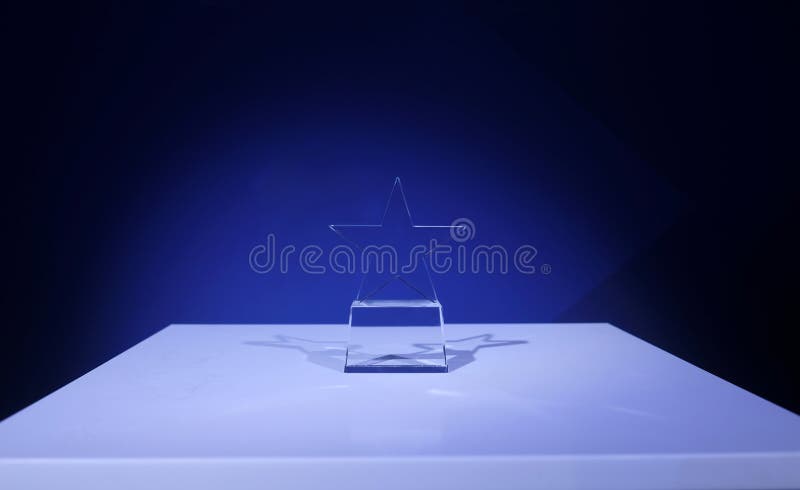 Star-shaped Award on a Table Stock Photo - Image of copy, competition ...